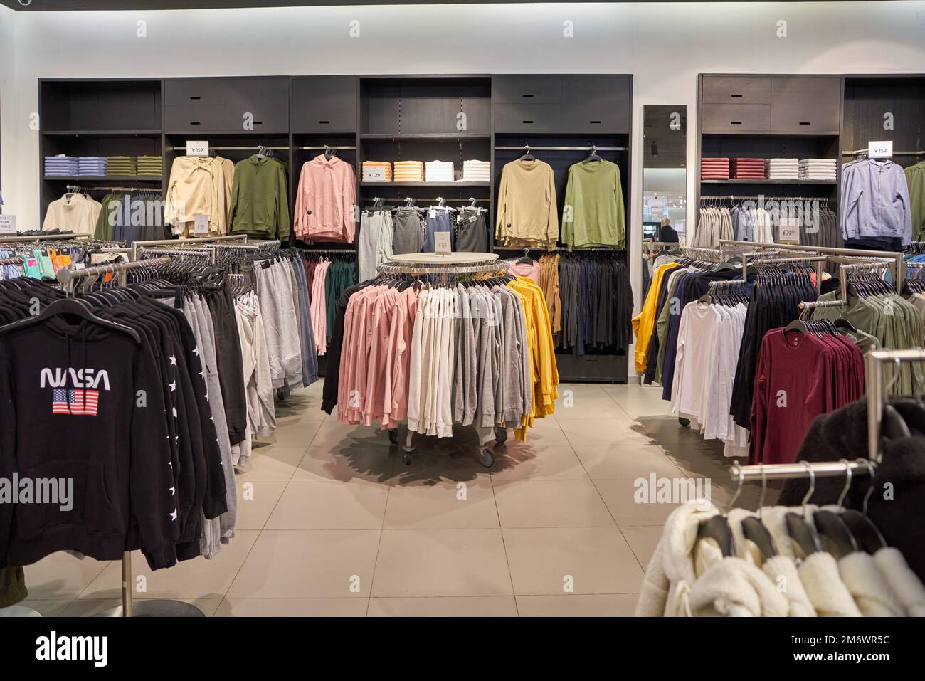 SHENZHEN, CHINA - CIRCA NOVEMBER, 2019: apparel on display at H and M ...