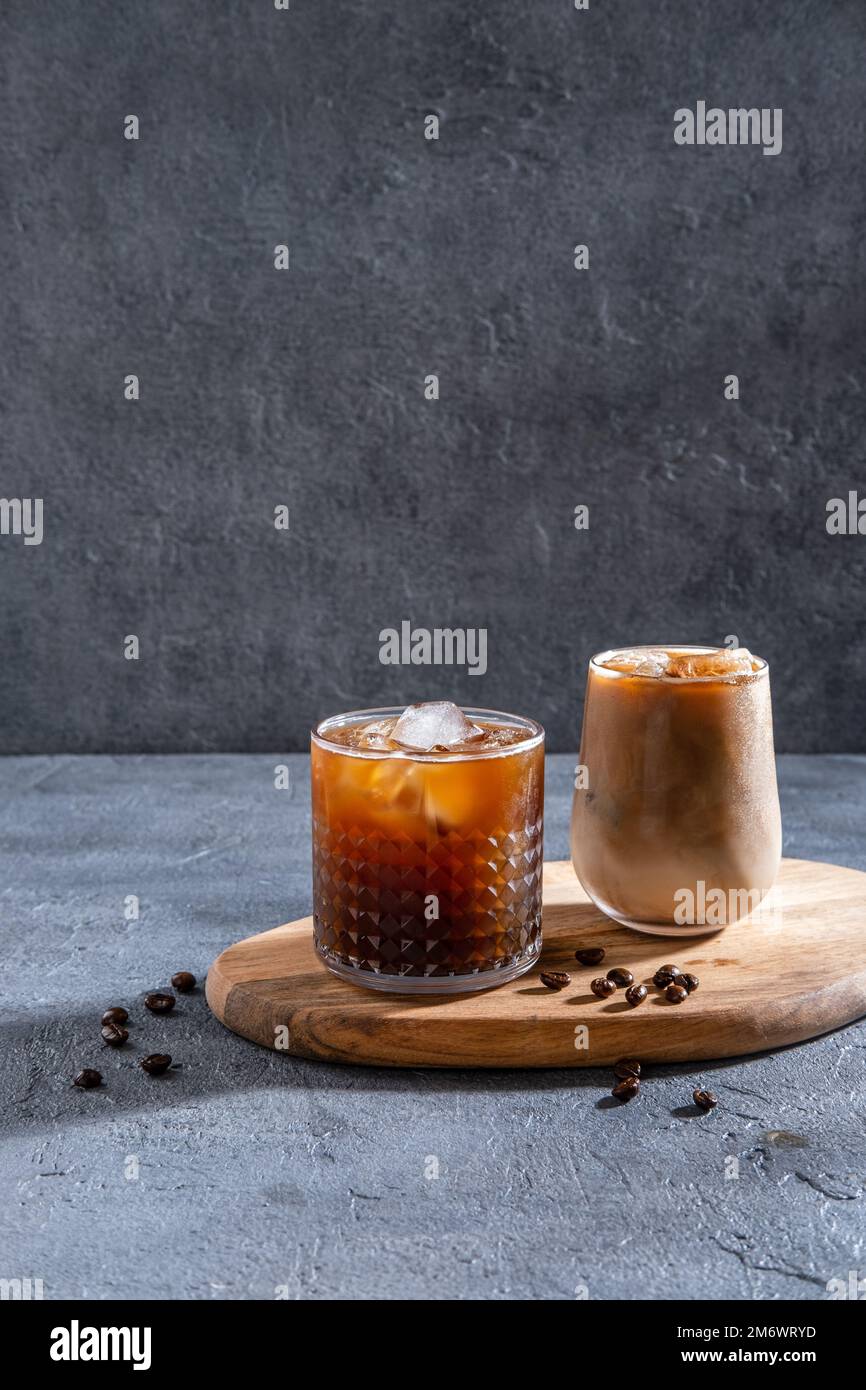 Espresso Tonic, cold drink with espresso and tonic in glass. Ice coffee in a tall glass with ...