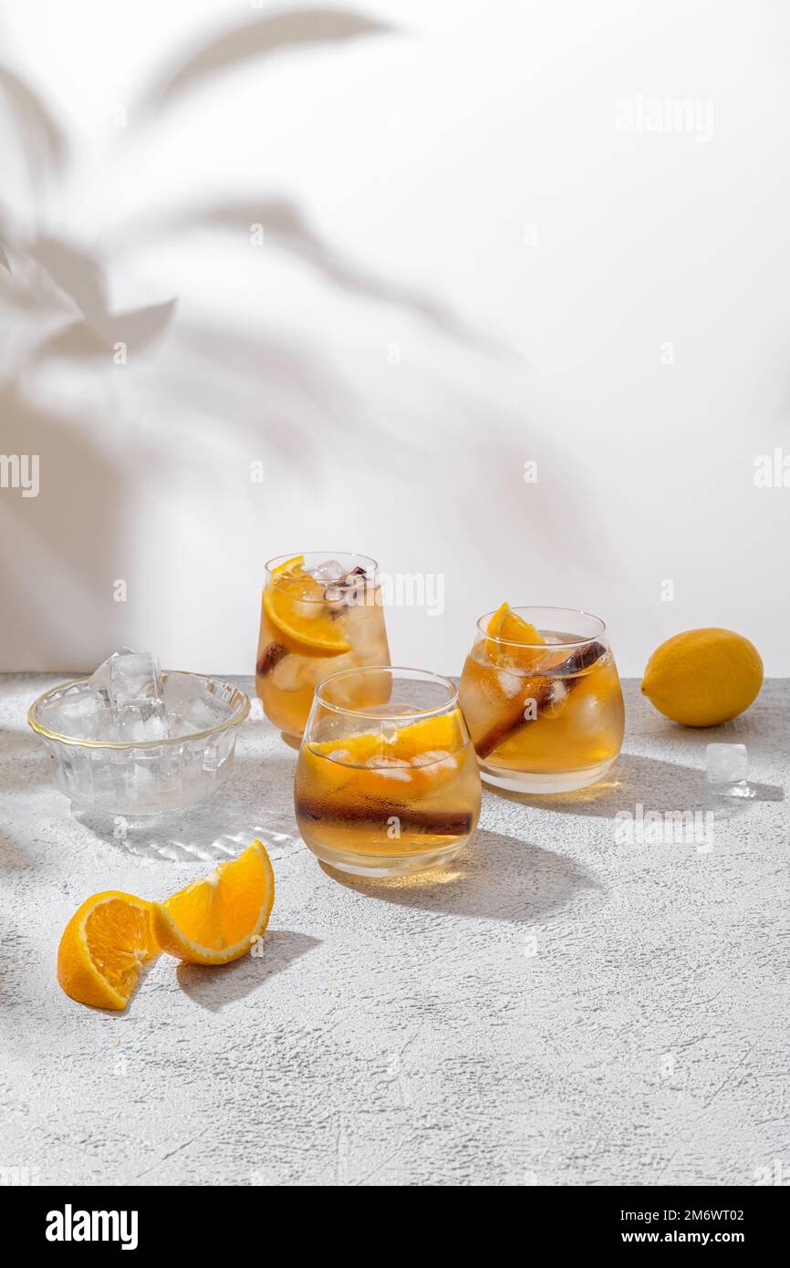 Sparkling holiday punch. Three glasses of sparkling punch on light ...