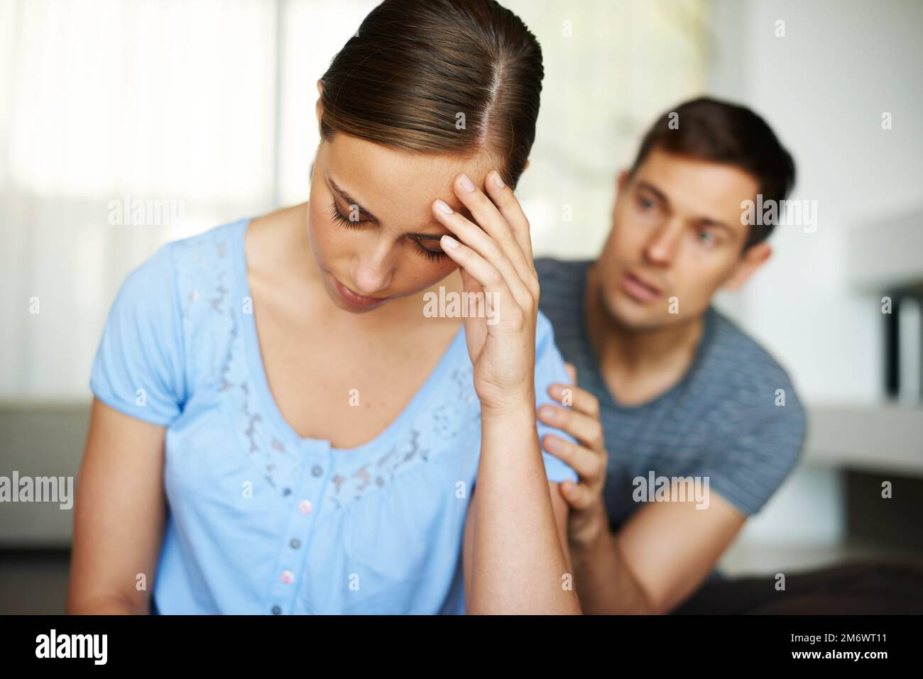 Lets not fight. a young couple having a disagreement at home Stock ...