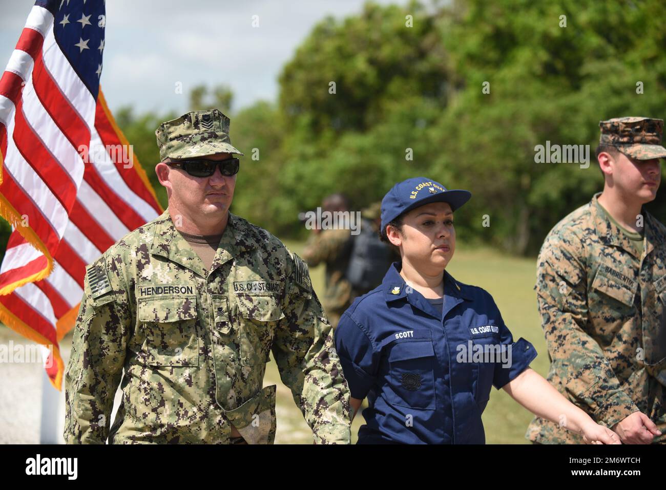 U.S. Coast Guard Petty Officer 1st Class Jared Henderson and Petty ...