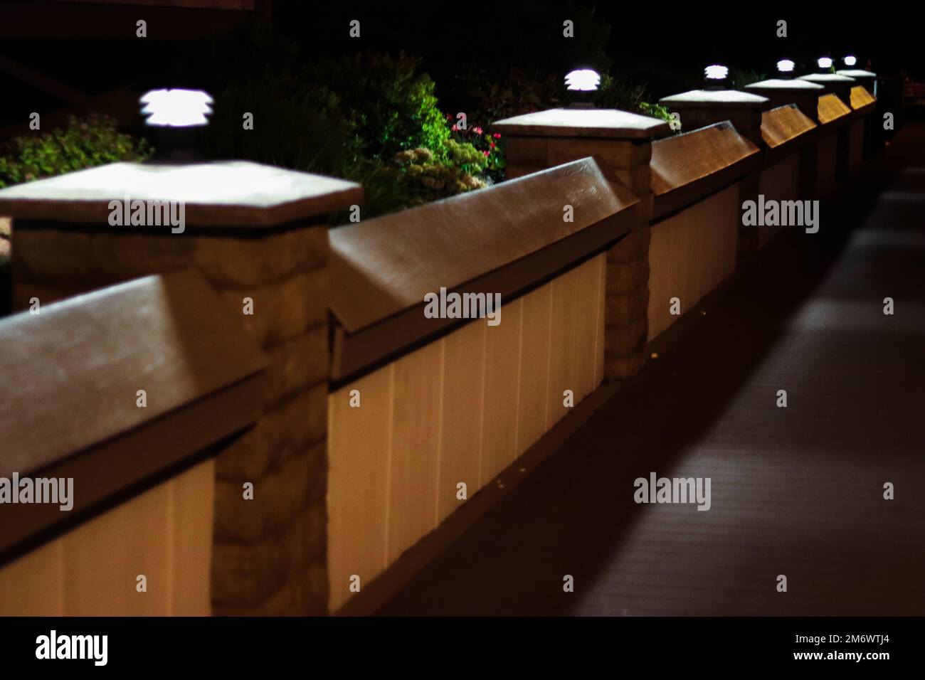Lights at night on the boardwalk Stock Photo - Alamy