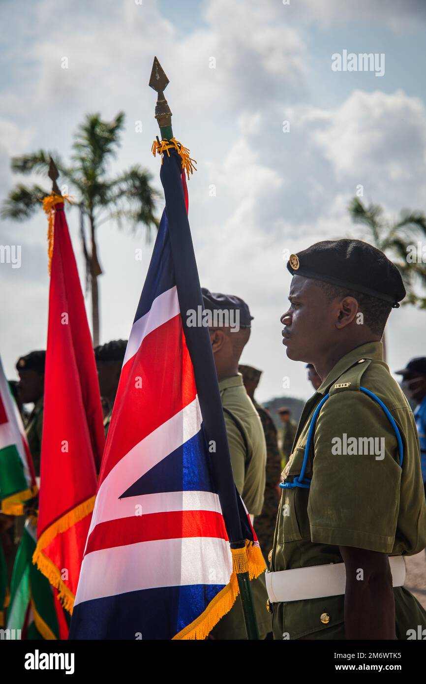 Belize Defence Force flag-bearers hold each of the 23 participating ...