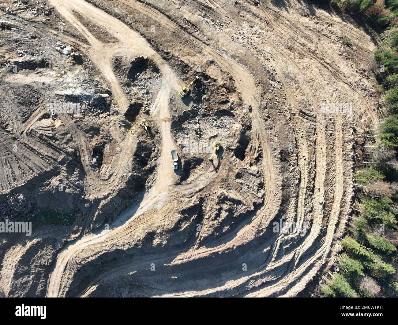 Industrial mine excavators are digging the soil in the construction ...