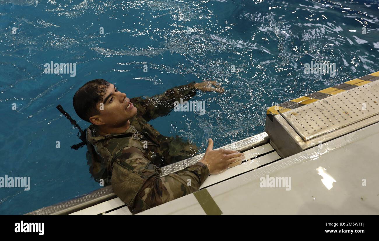 A U.S. Soldier participates in an Army Water Survival Assessment at the ...