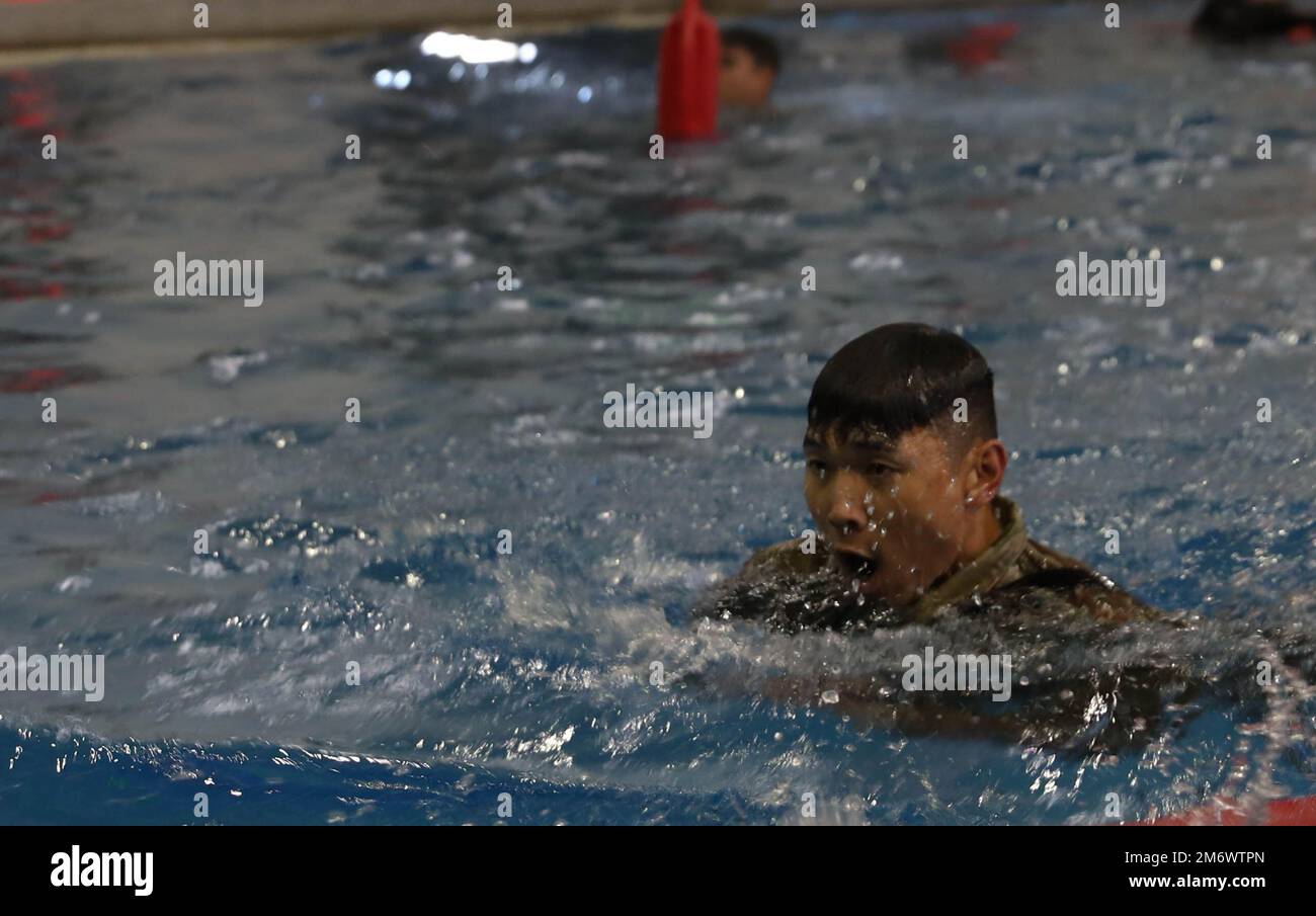 A U.S. Soldier conducts an Army Water Survival Assessment at the Lt ...