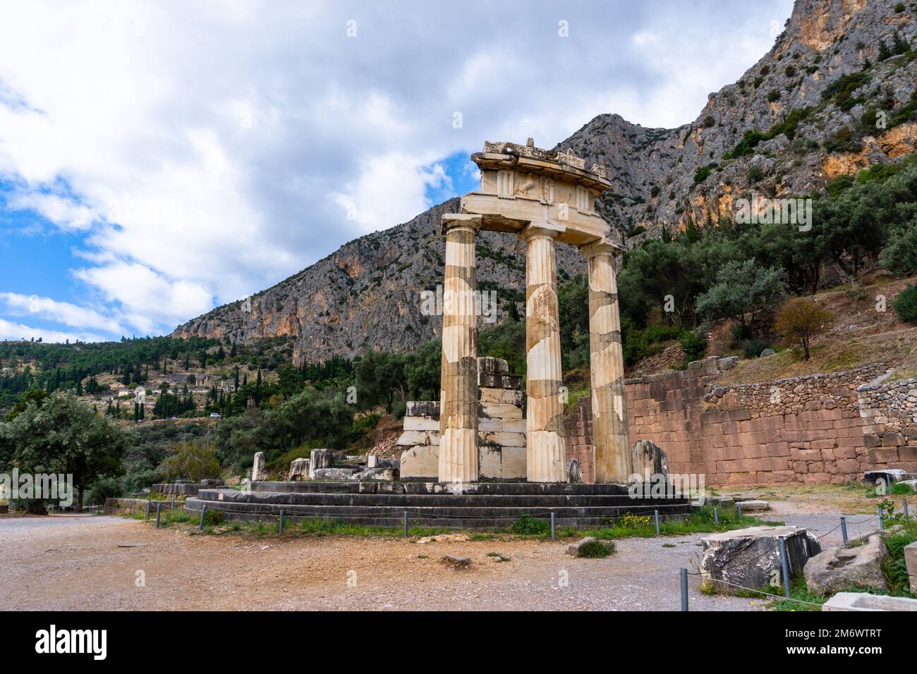View of the Tholos of Delphi in the Sanctuary of Athena Pronaia in ...