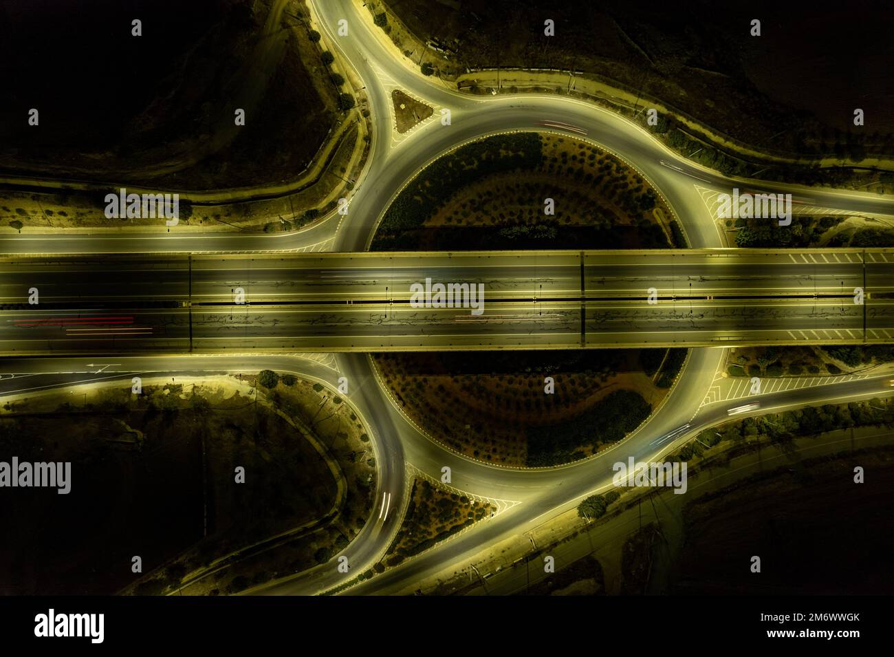 Aerial drone top view of motorway junction. Roundabout cars moving ...