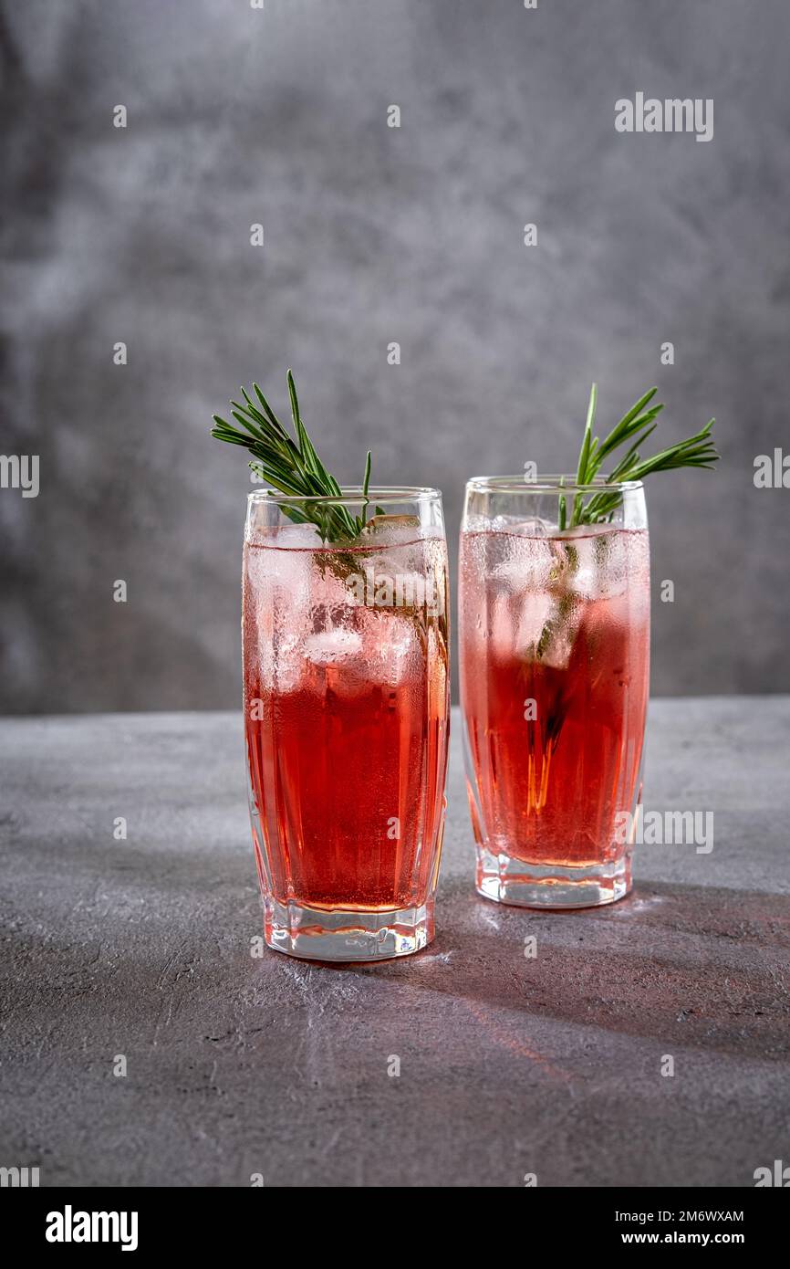 Summer refreshing alcoholic cocktails. Raspberry lemonade garnished ...