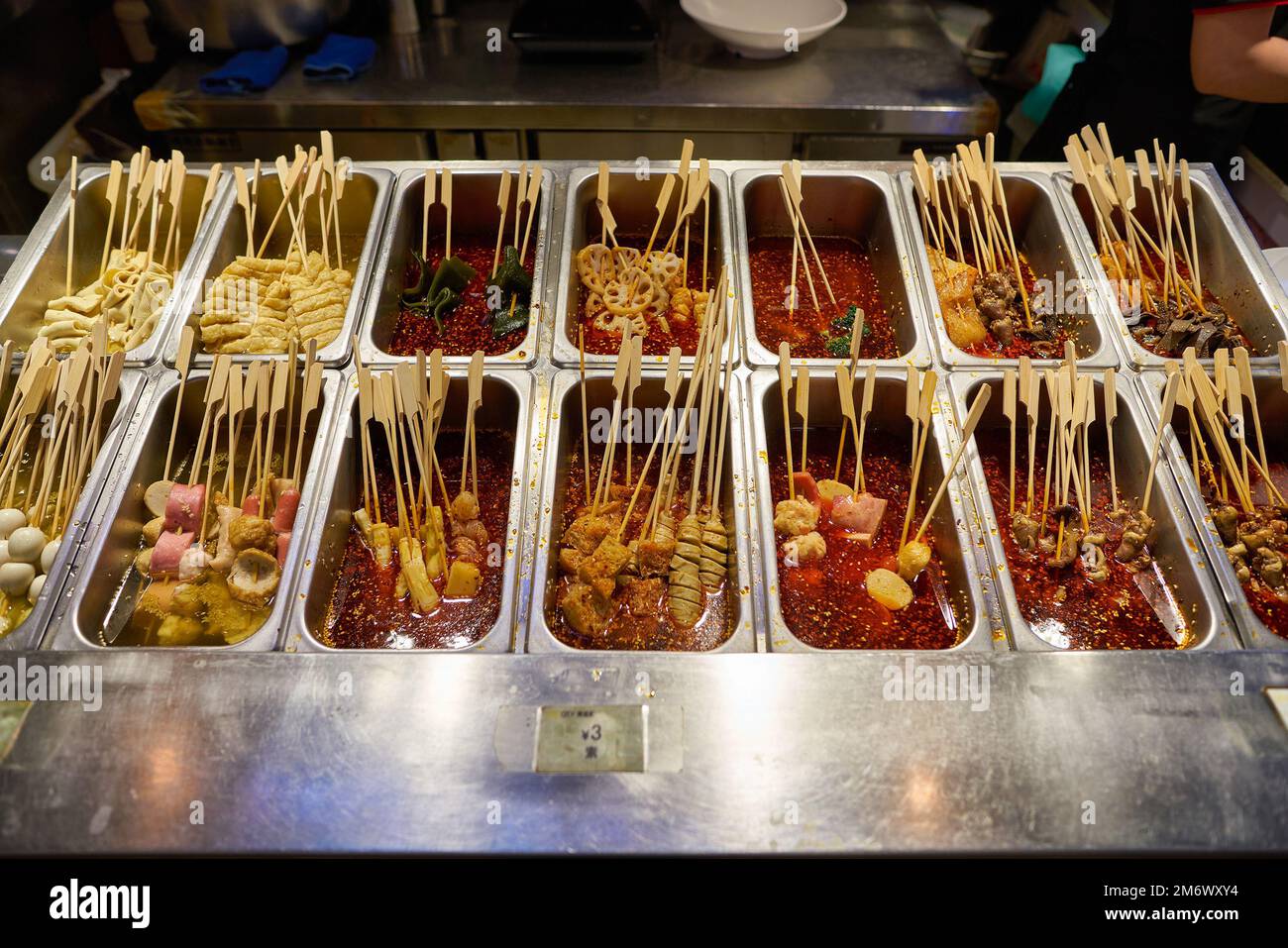 SHENZHEN, CHINA - CIRCA NOVEMBER, 2019: various food on sticks on ...