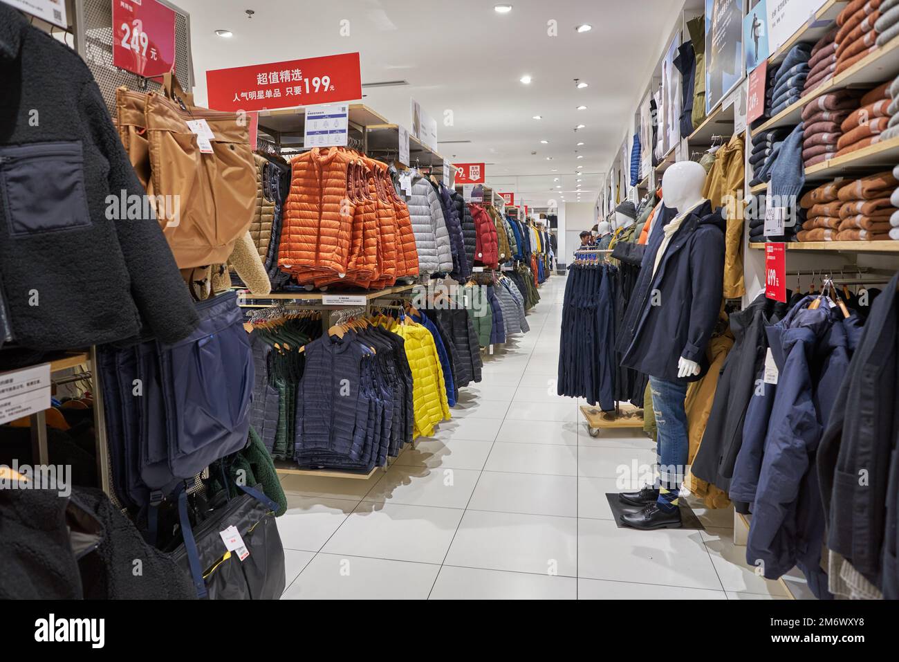 SHENZHEN, CHINA - CIRCA NOVEMBER, 2019: apparel on display at Uniqlo ...