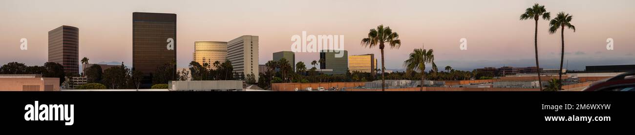 Sunset view of the downtown skyline of Costa Mesa, California, USA ...