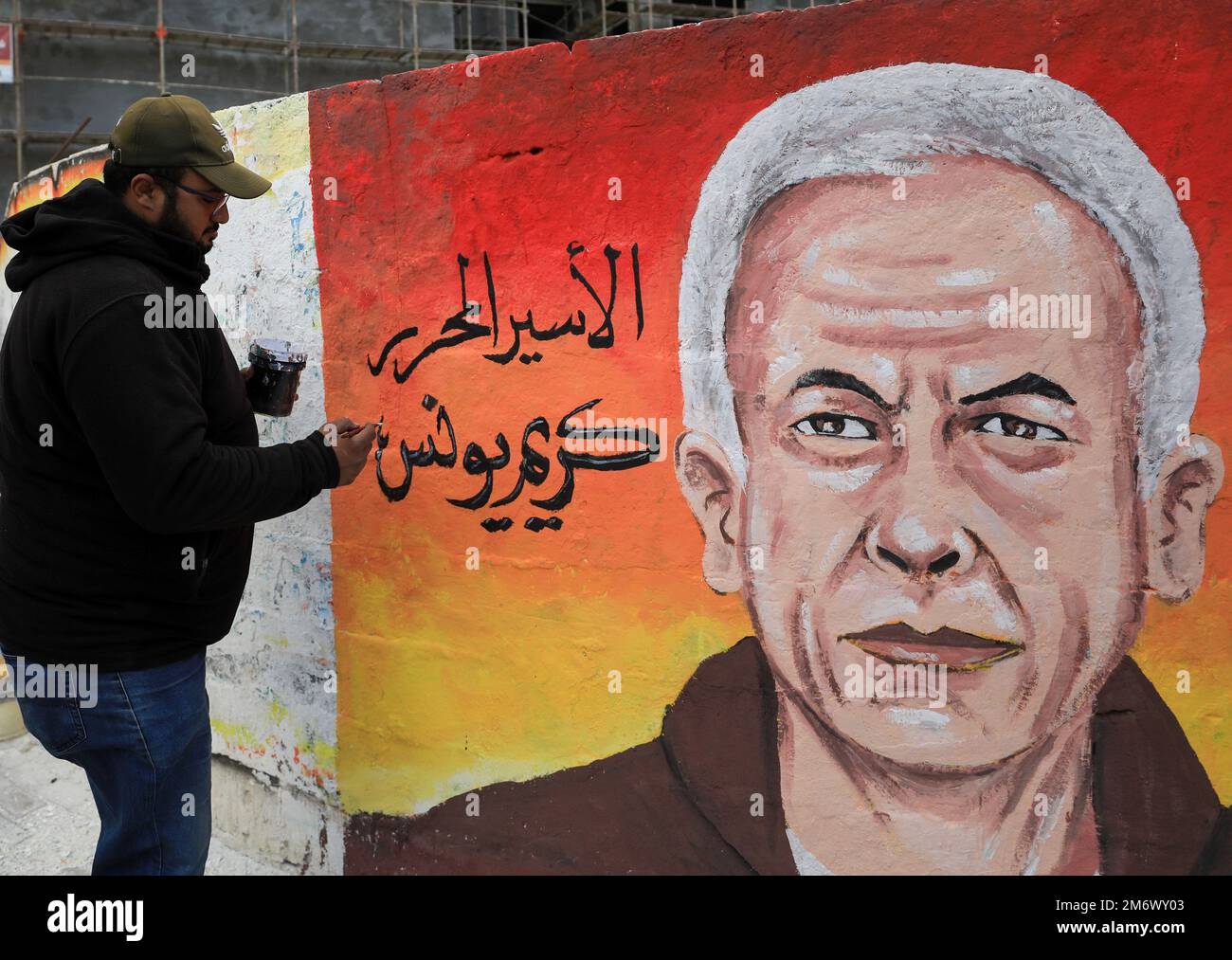 Gaza, Palestine. 05th Jan, 2023. An artist paints a mural dedicated to ...