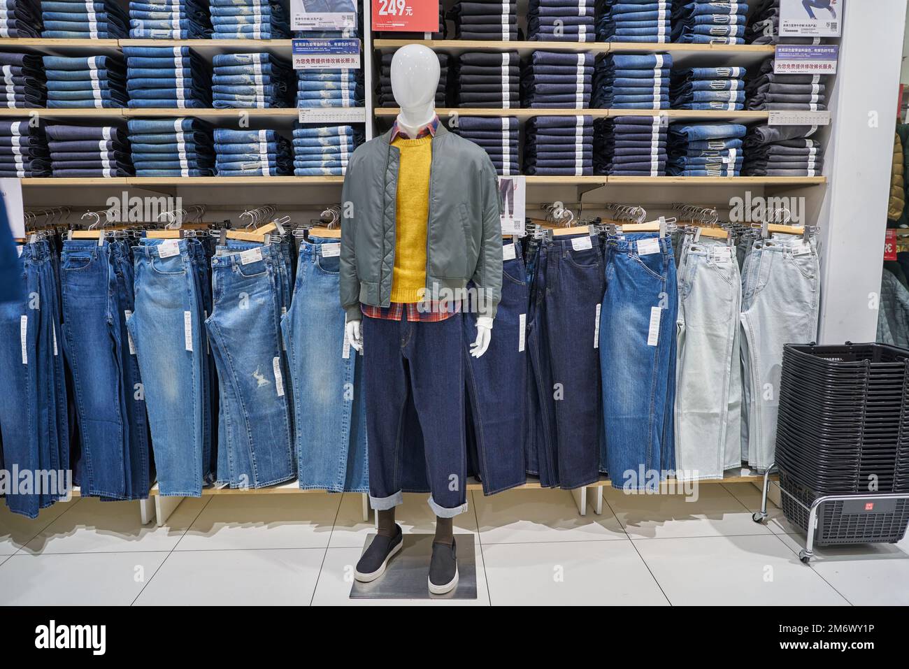 SHENZHEN, CHINA - CIRCA NOVEMBER, 2019: apparel on display at Uniqlo ...