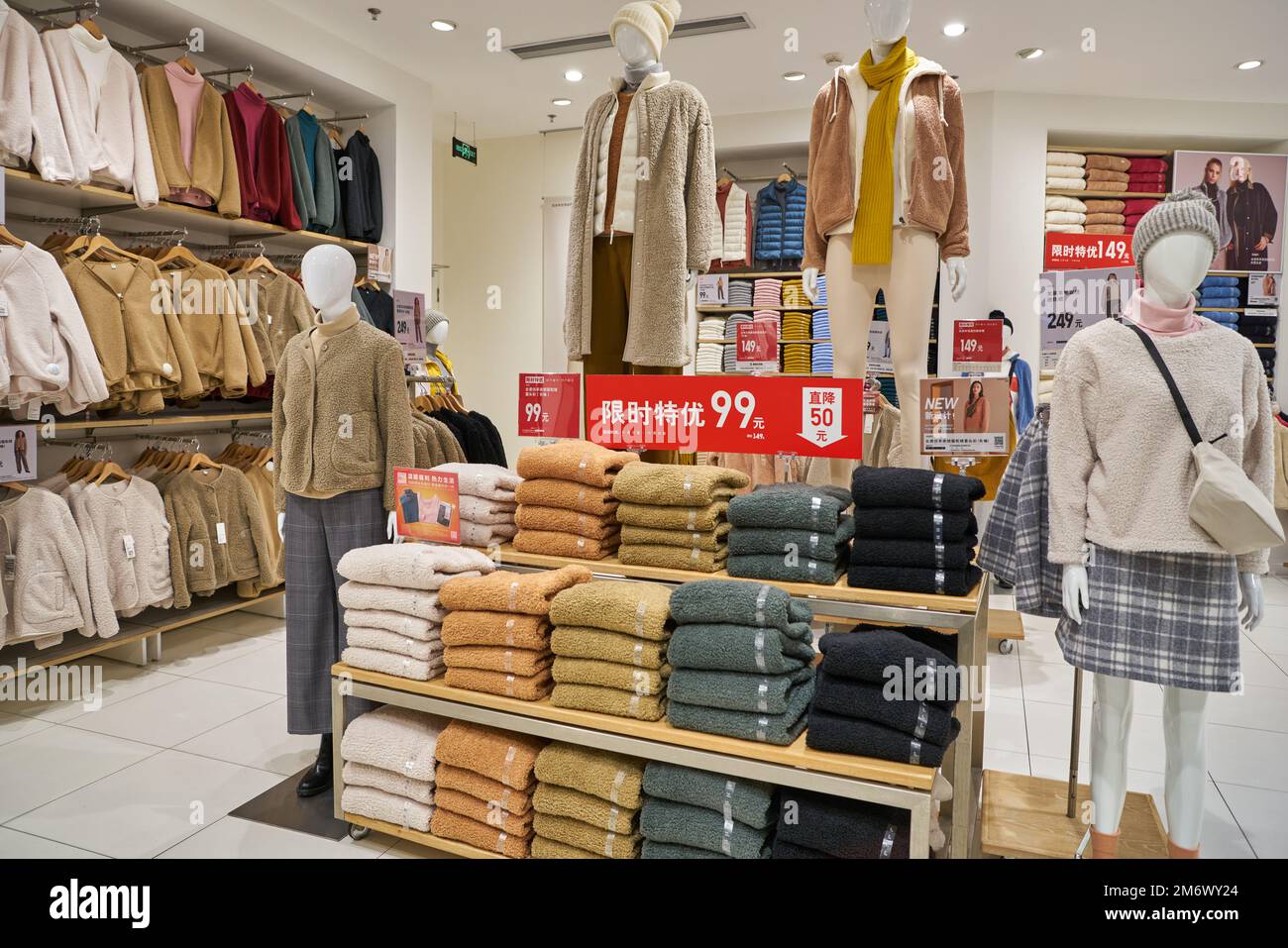 SHENZHEN, CHINA - CIRCA NOVEMBER, 2019: apparel on display at Uniqlo ...