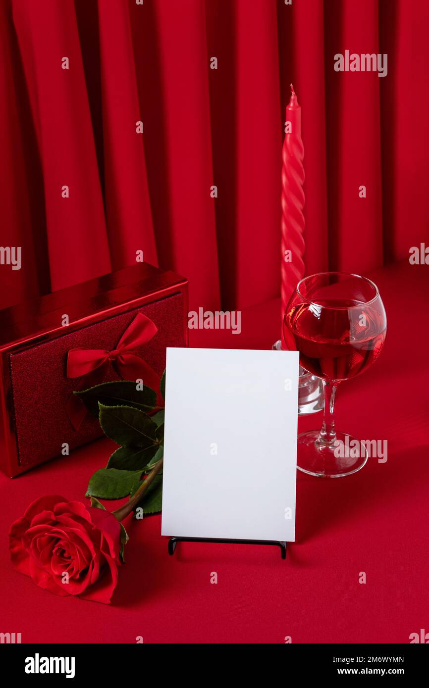Valentine's Day blank message card with red rose and red gift box ...