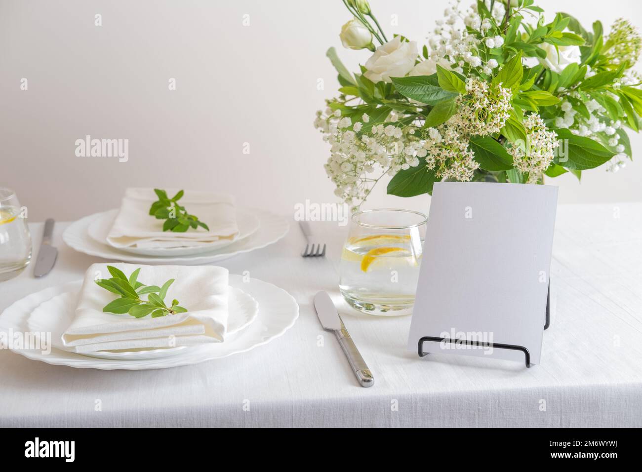 Mockup white blank space card for table number or menu. Wedding teble ...