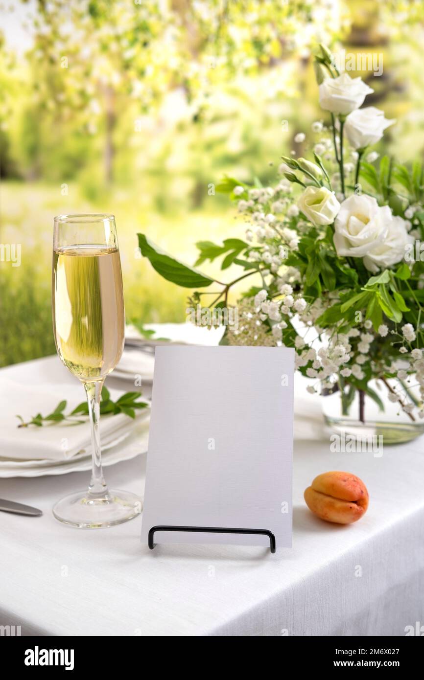 Mockup white blank space card for table number or menu. Wedding teble ...