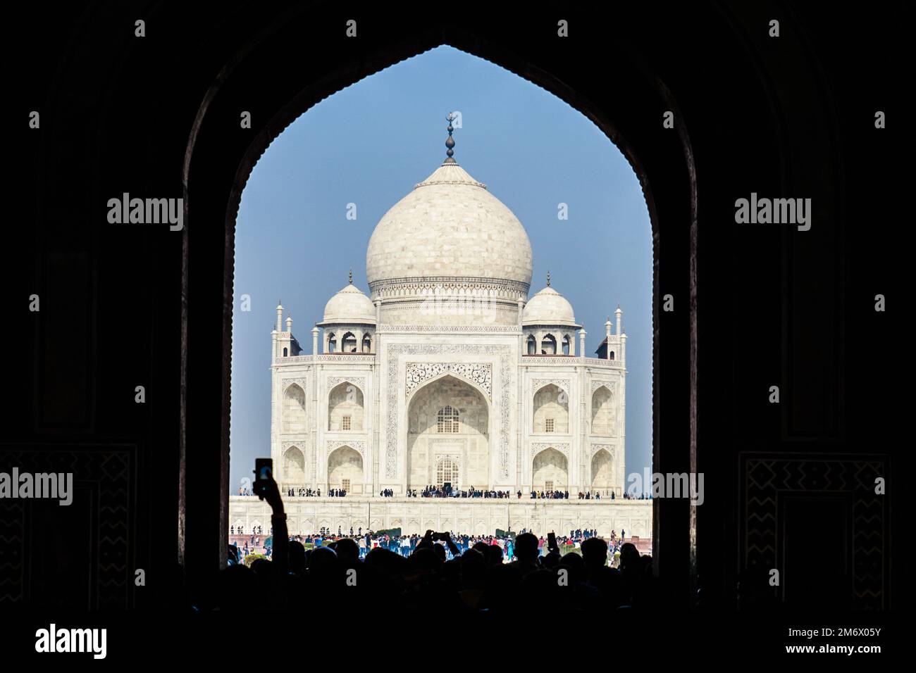 Taj Mahal which is visible from the large tower gate (India, Agra Stock ...