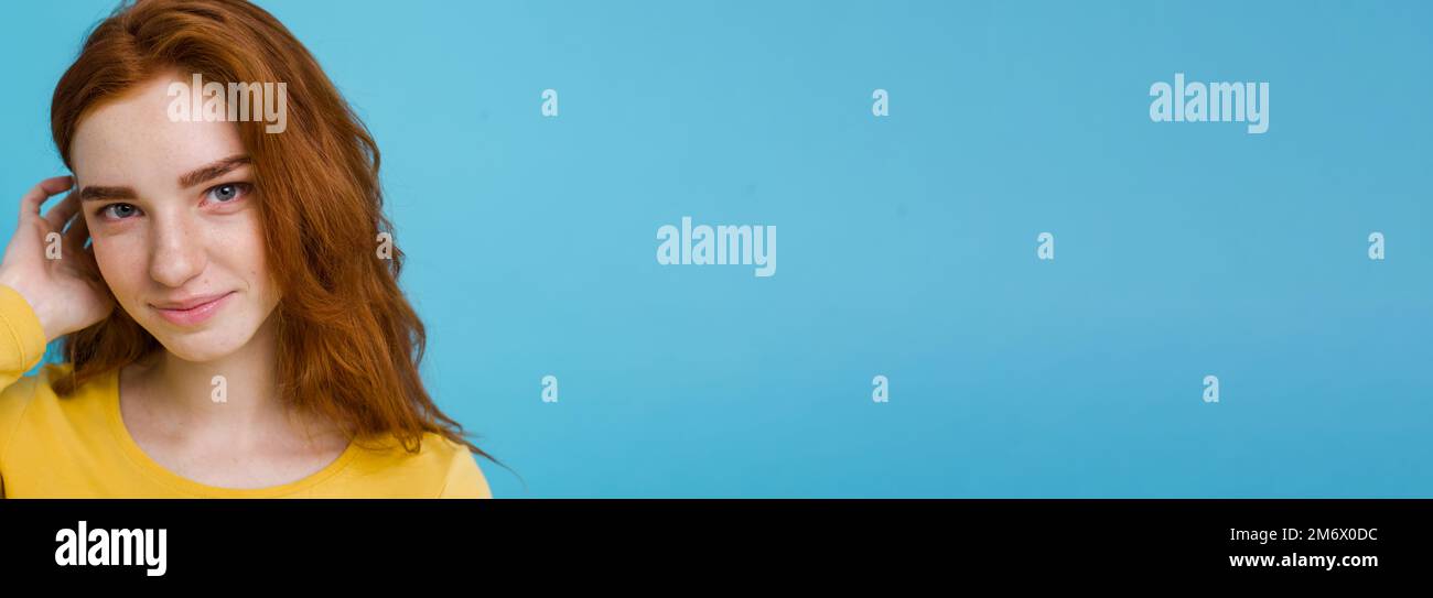 Headshot Portrait of happy ginger red hair girl with freckles smiling ...