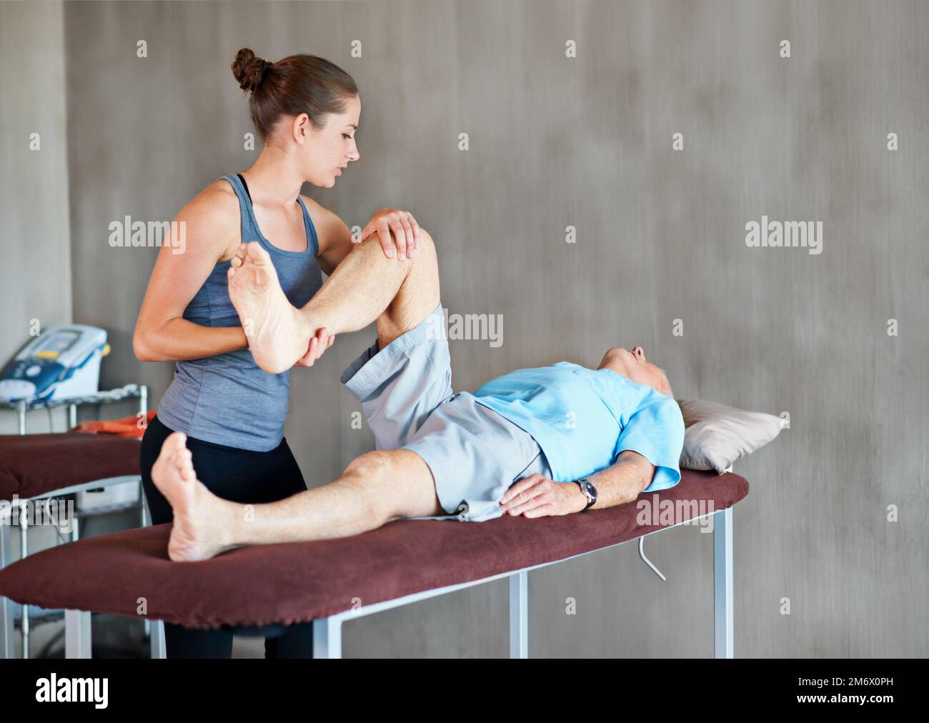 Helping her patients stay strong and healthy. a a physical therapist ...