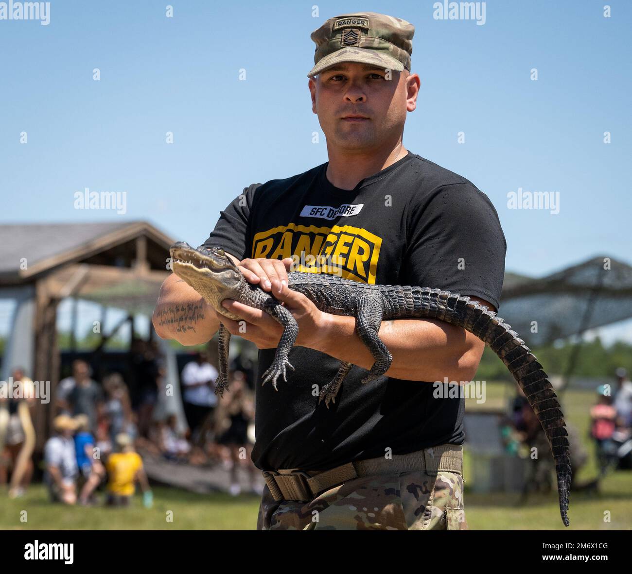 Sgt. 1st Class Frank Defiore, 6th Ranger Training Battalion, carries ...