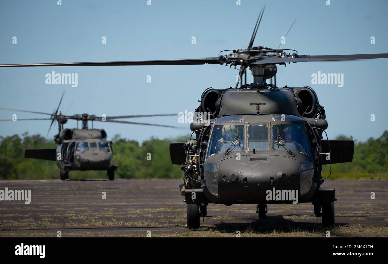 Army UH-60 Blackhawk helicopters land after a demonstration at the 6th ...