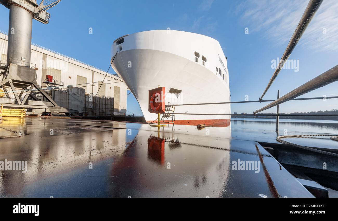 Flensburg, Germany. 23rd Dec, 2022. A new ship is moored at the fitting ...