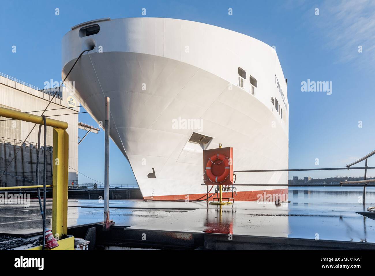 Flensburg, Germany. 23rd Dec, 2022. A new ship is moored at the fitting ...