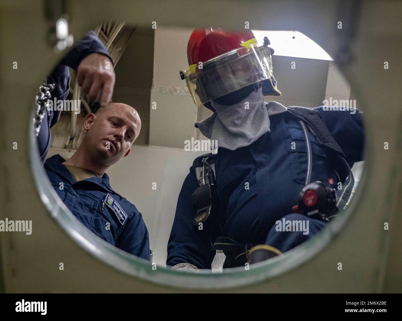 PHILIPPINE SEA (MAY 7, 2022) Yeoman 1st Class Jacob Miller (left), from ...