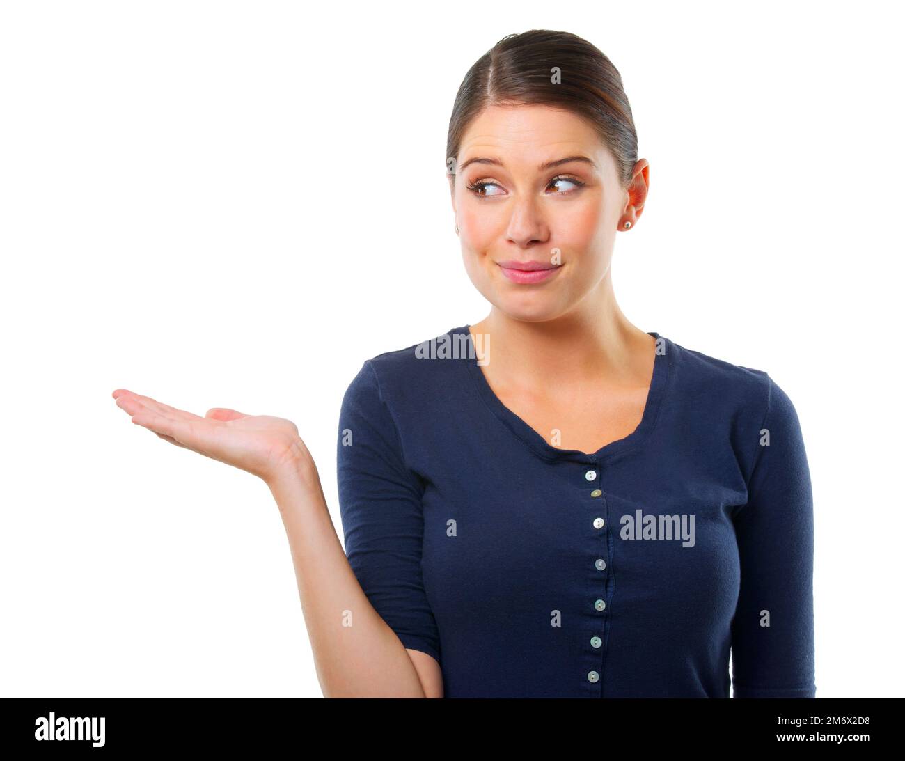 Presenting your product. Studio shot of a beautiful young woman with ...