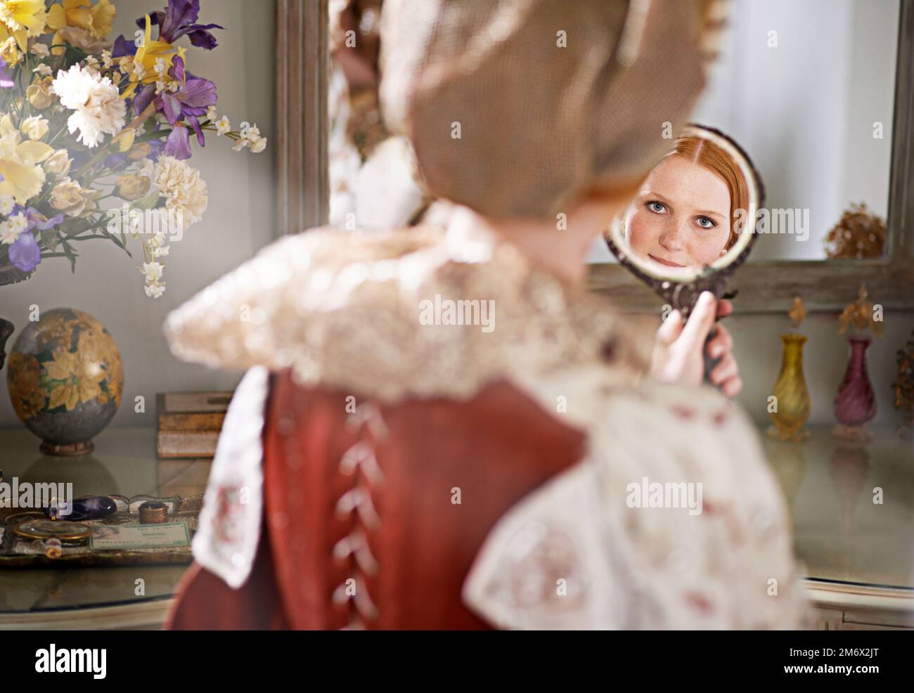 Beauty and elegance of the aristocratic. a noble lady looking at ...