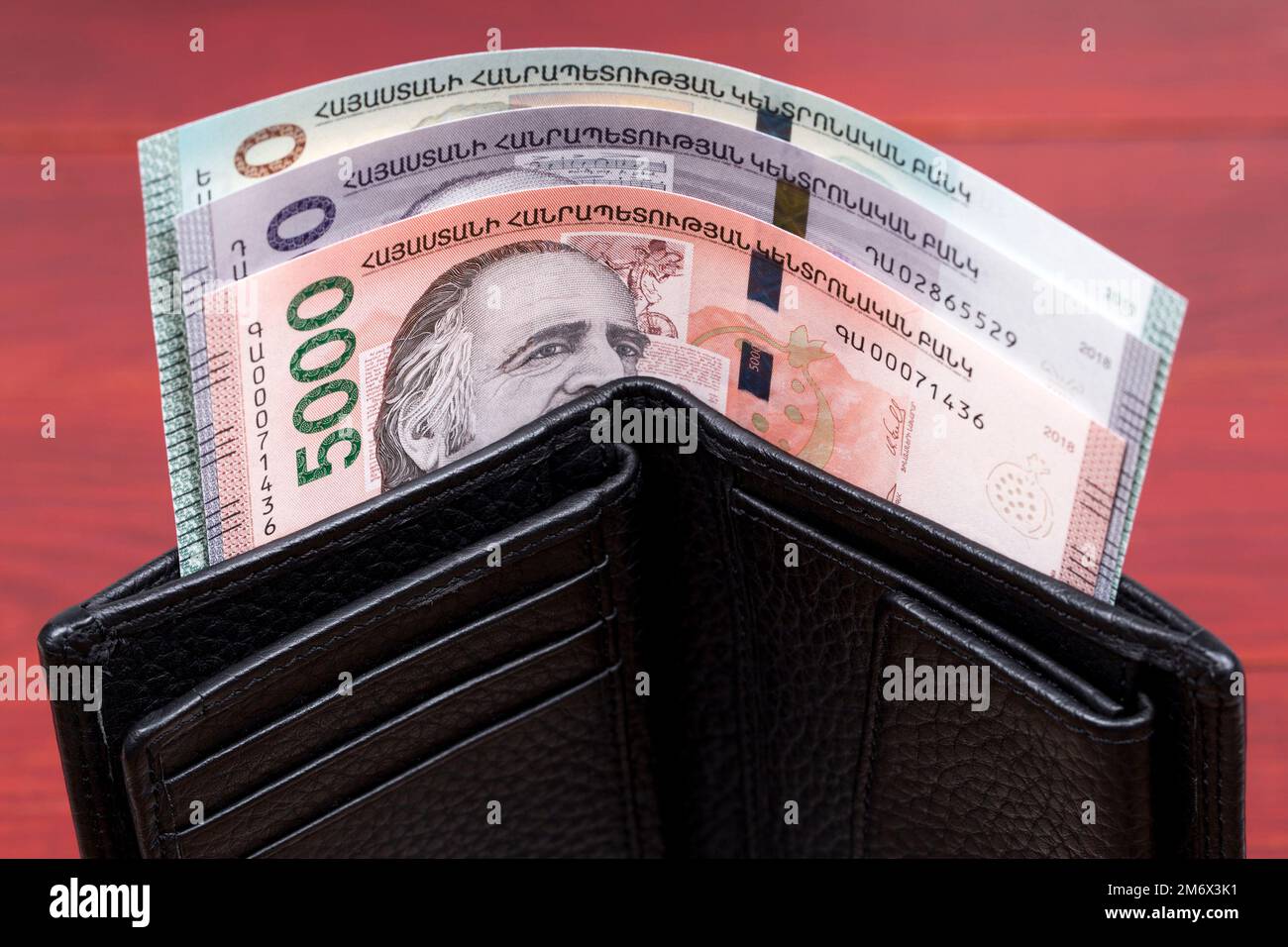 Armenian money - dram in the black wallet Stock Photo - Alamy