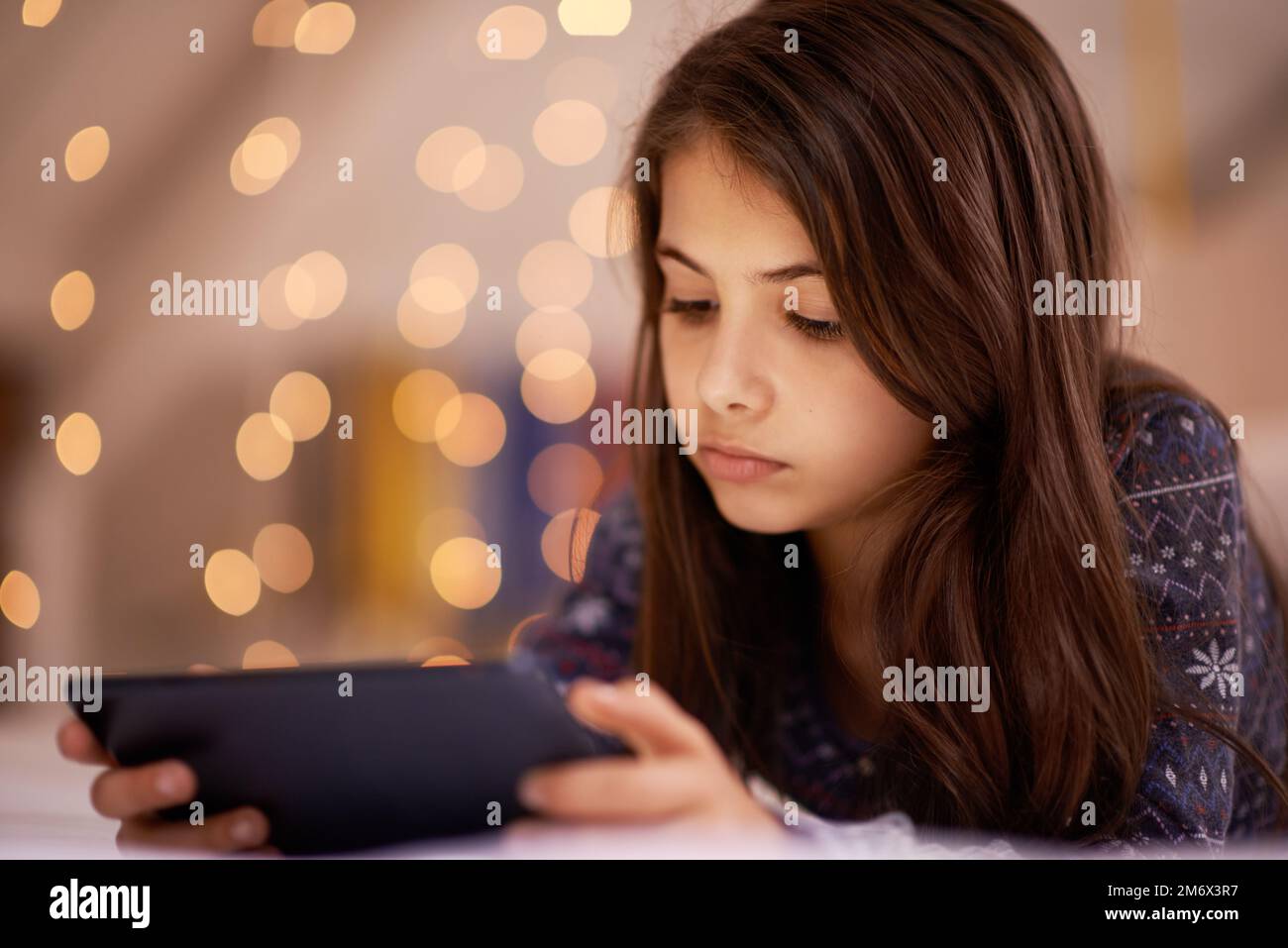Lets take a shot at this technology thing. a cute little girl using a ...