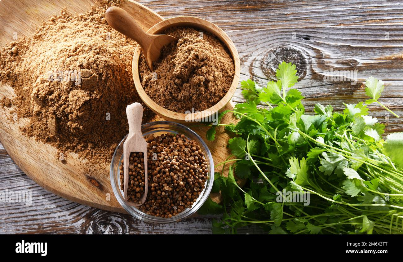Composition with ground coriander Stock Photo - Alamy