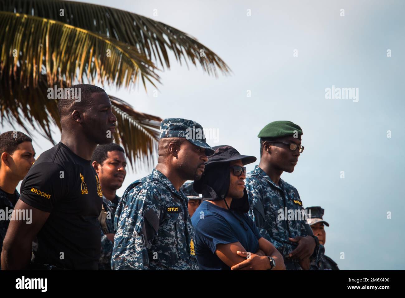 Jamaican divers participate in the dive training briefing during ...