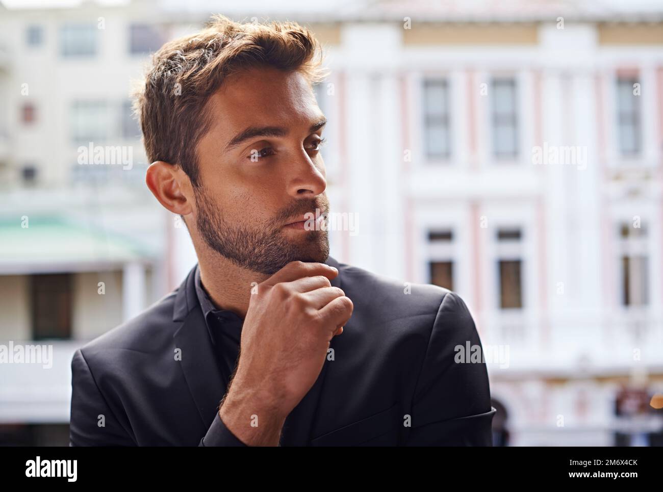 Stylishly confident. a handsome and confident young man Stock Photo - Alamy