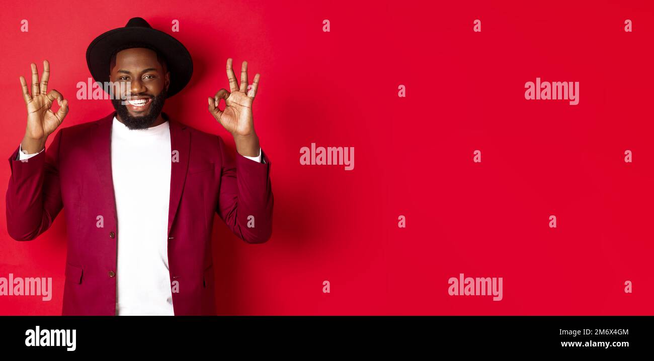 Christmas shopping and people concept. Satisfied african american male ...