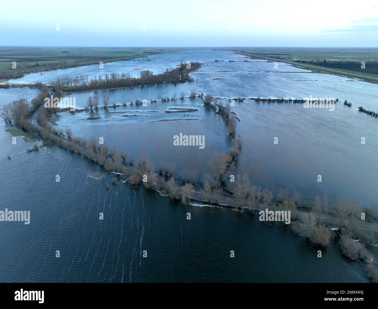 The Welney wash fills with floodwater as the levels of The Old Bedford ...