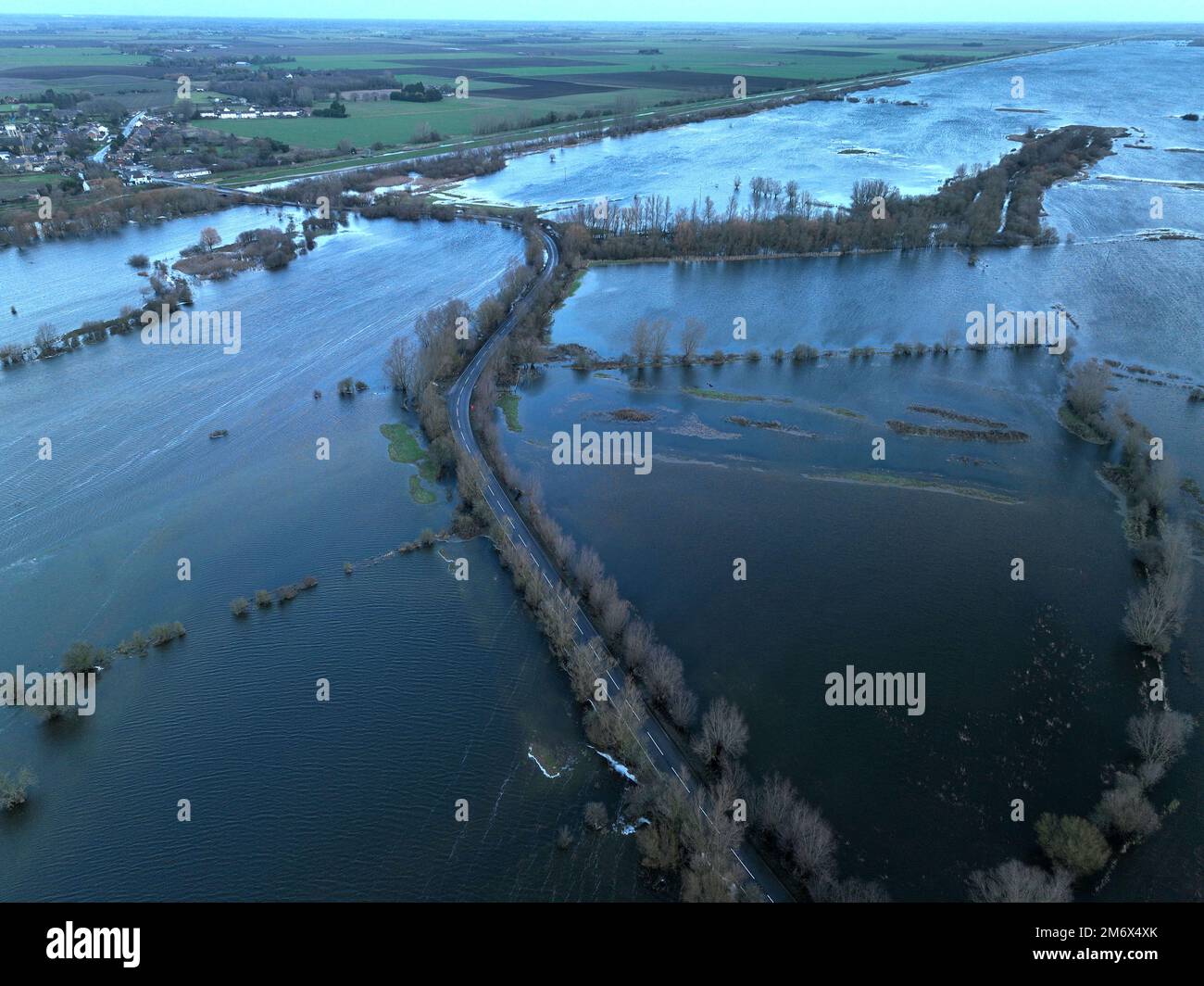 The Welney wash fills with floodwater as the levels of The Old Bedford ...