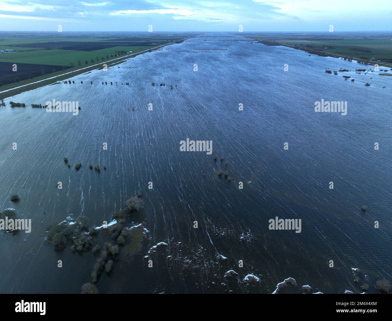 The Welney wash fills with floodwater as the levels of The Old Bedford ...