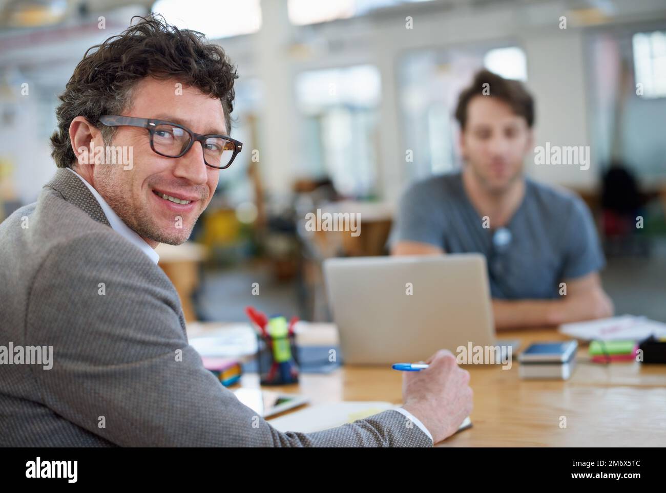 New project Bring it on. Portrait of two people working together in a ...