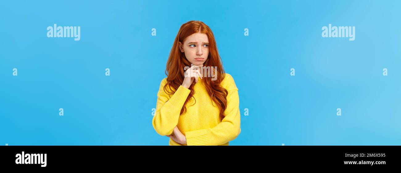 Sad timid and lonely redhead woman too feeling let down and depressed ...