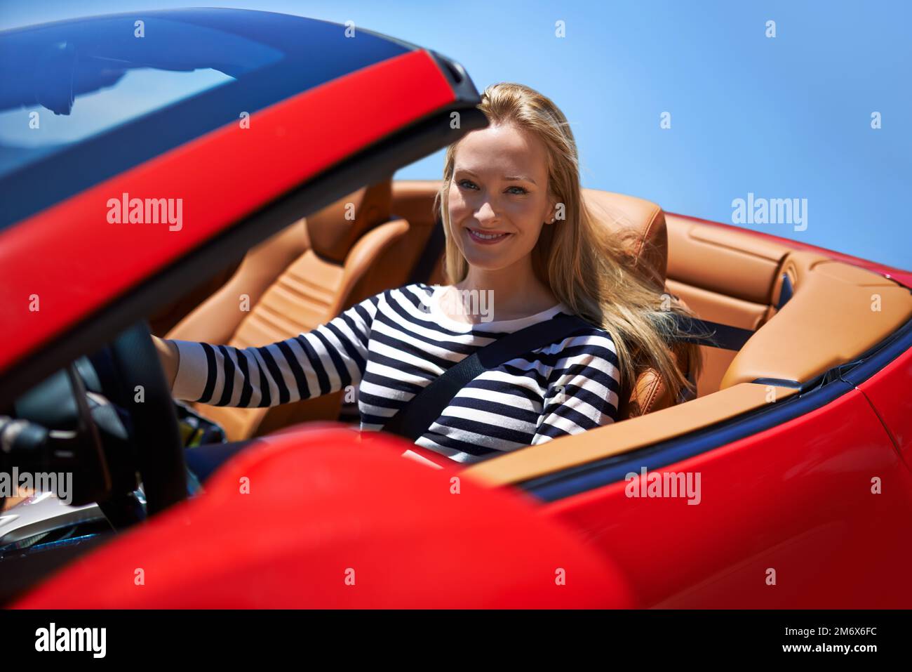 One woman driving luxury car hi-res stock photography and images - Alamy