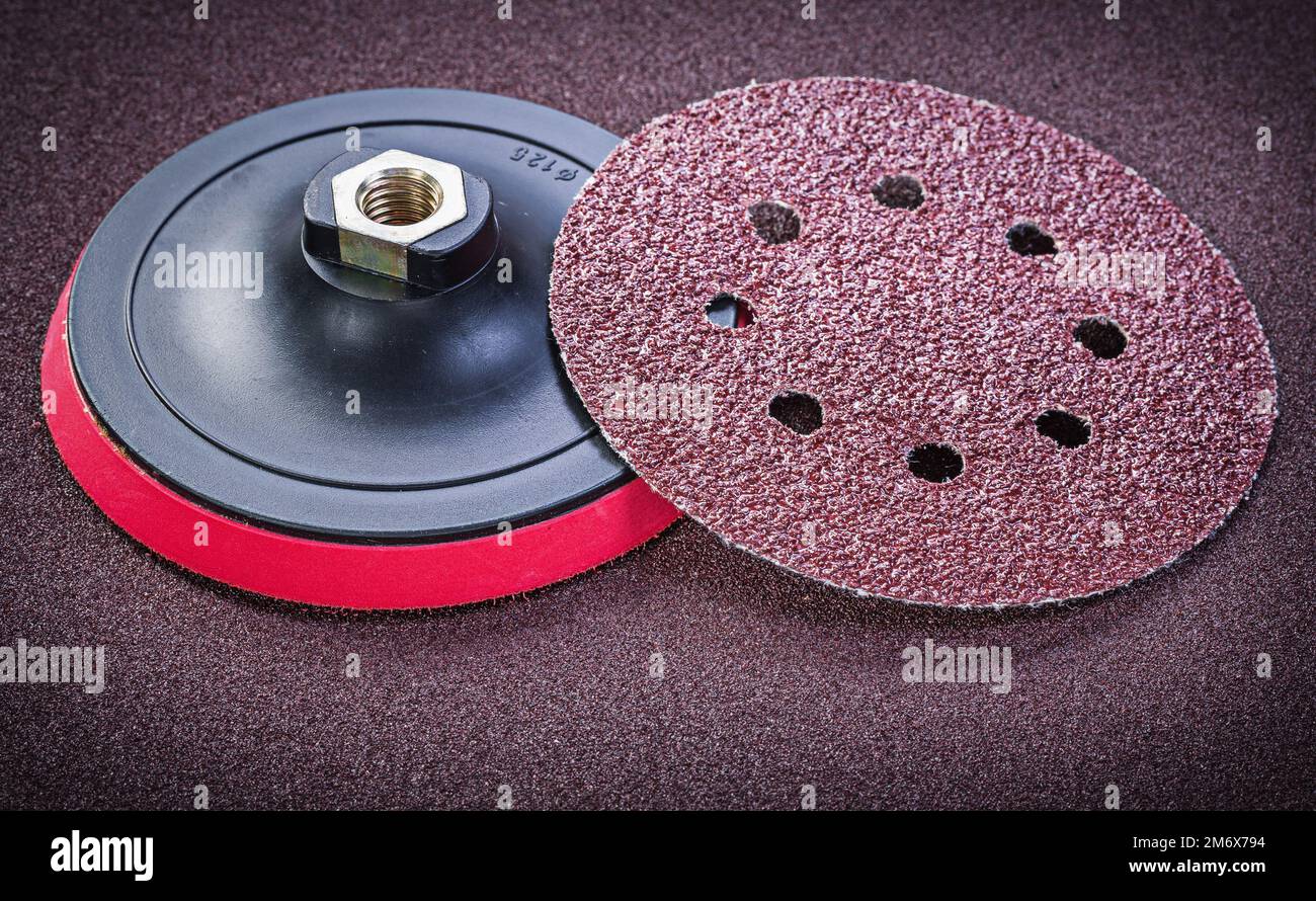 Abrasive discs holder on sandpaper sheet top view Stock Photo - Alamy