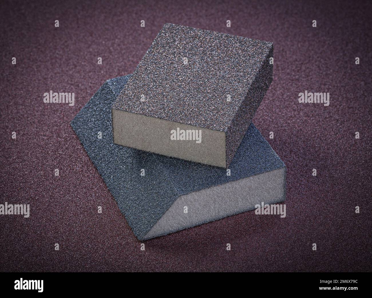 Abrasive sponges on polishing paper top view Stock Photo - Alamy