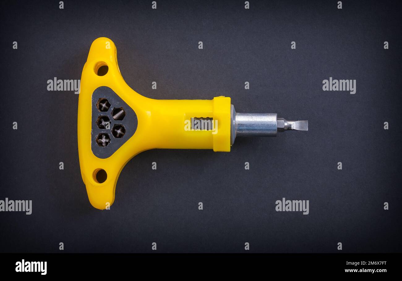 Industrial concept yellow screwdriver hi-res stock photography and ...