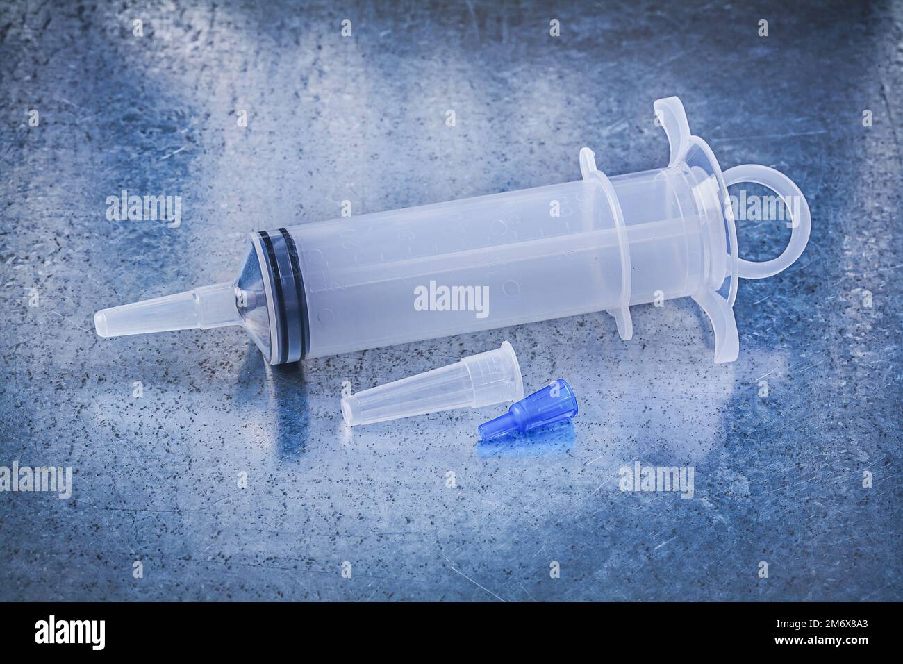 Big disposable syringe on metallic background medicine concept Stock ...