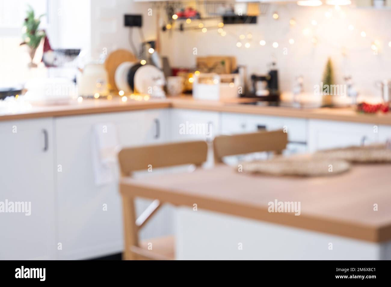 Interior background in a blur of white wooden kitchen of Festive ...