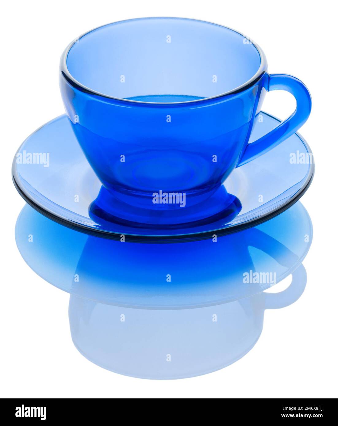 blue cup on the sauser isolated Stock Photo - Alamy